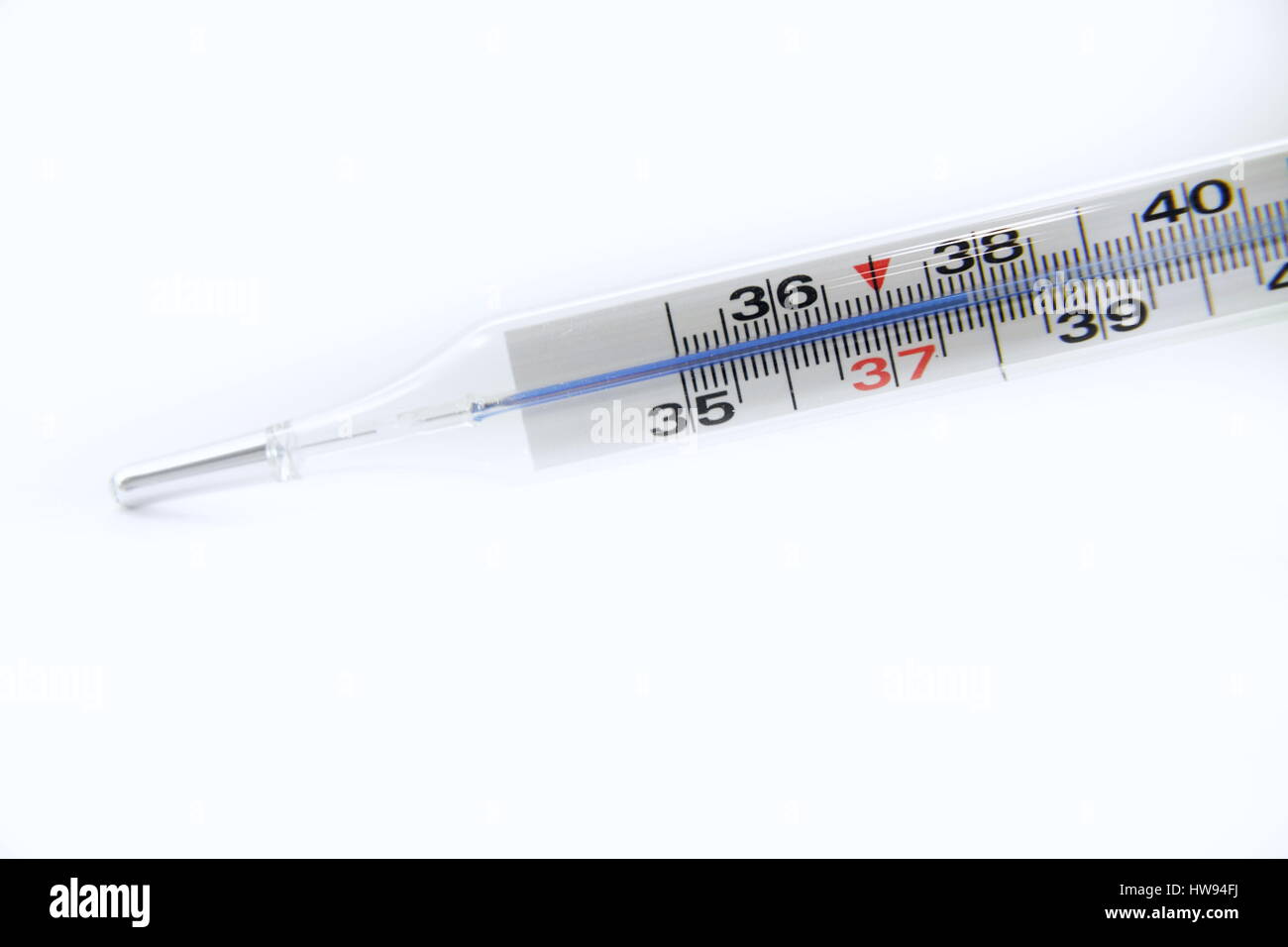 Medical thermometer indicating temperature 37.8 Celsius degrees ...