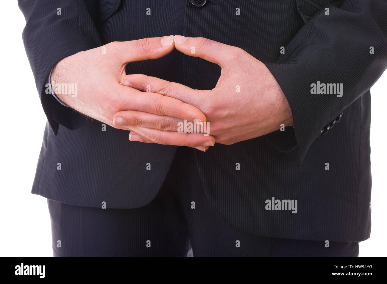 Business man waiting with folded hands Stock Photo - Alamy