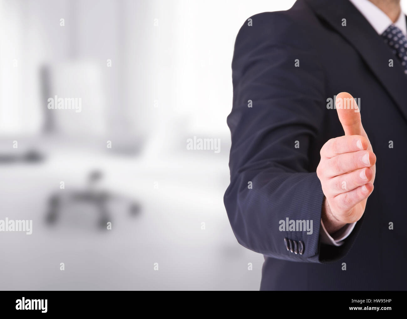 Business man giving hand Stock Photo - Alamy