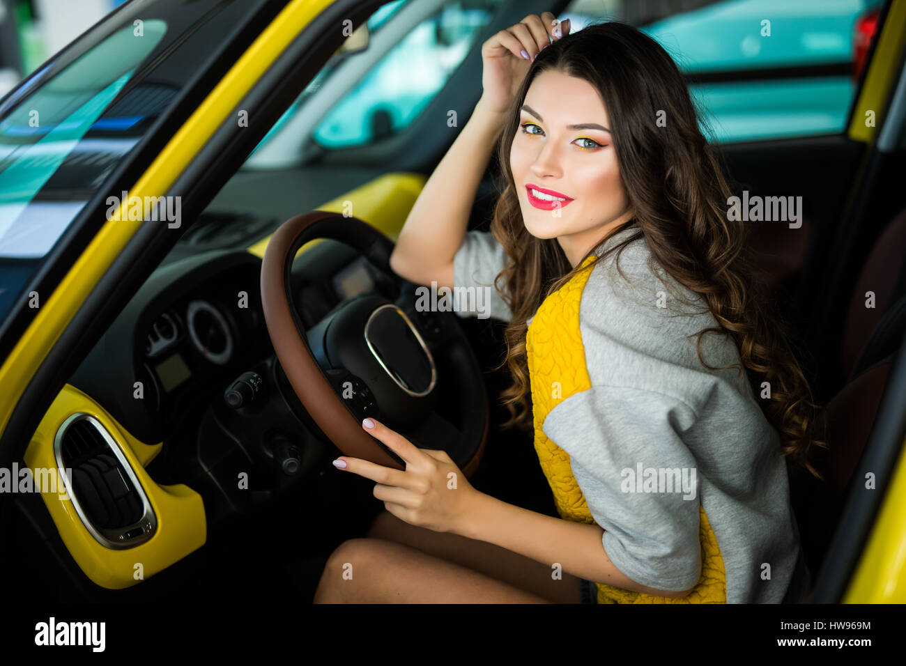 Beautiful Smiling woman driving car, attractive girl sitting in ...