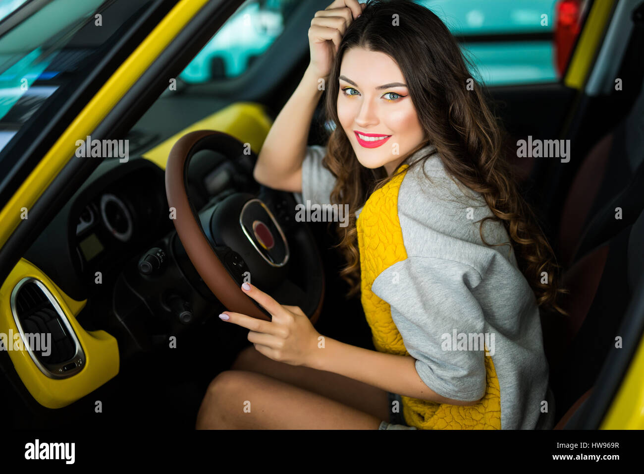 Beautiful Smiling woman driving car, attractive girl sitting in ...