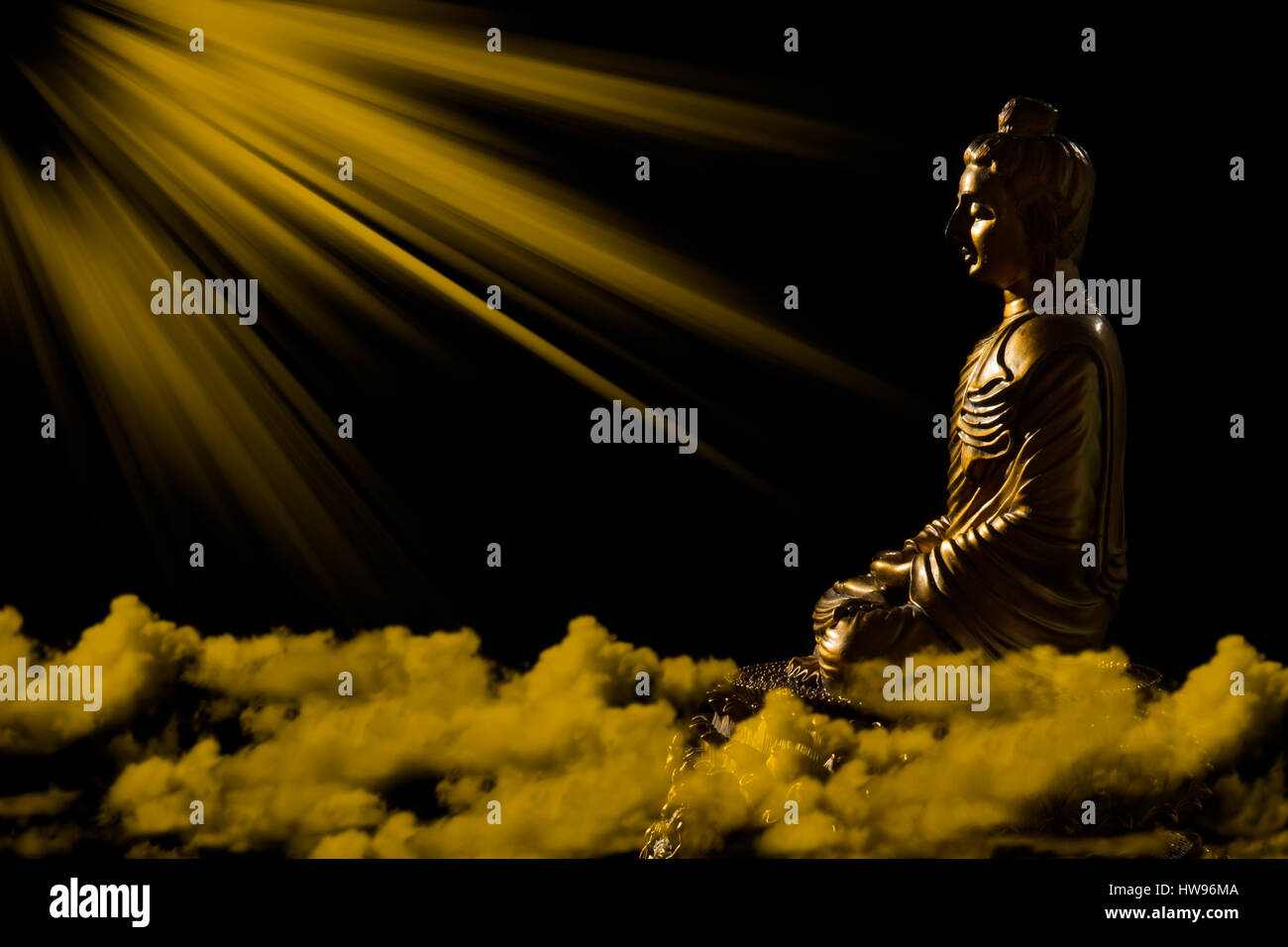 Golden Buddha Statue with Sunray Effect in isolated Black Background ...