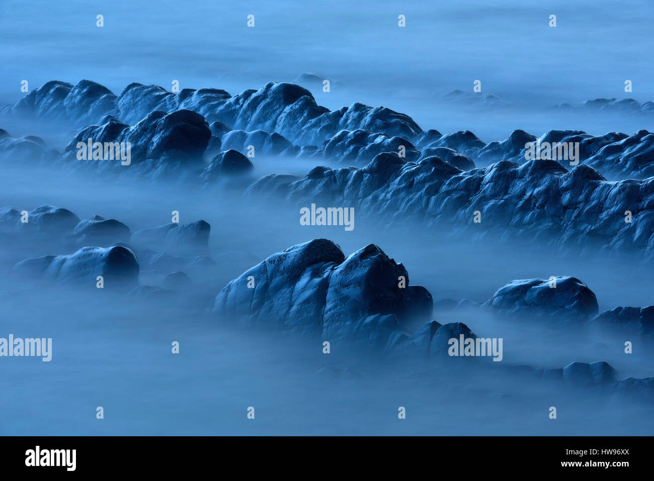 Blue hour, rock formations, rocks in the ocean, long time exposure ...