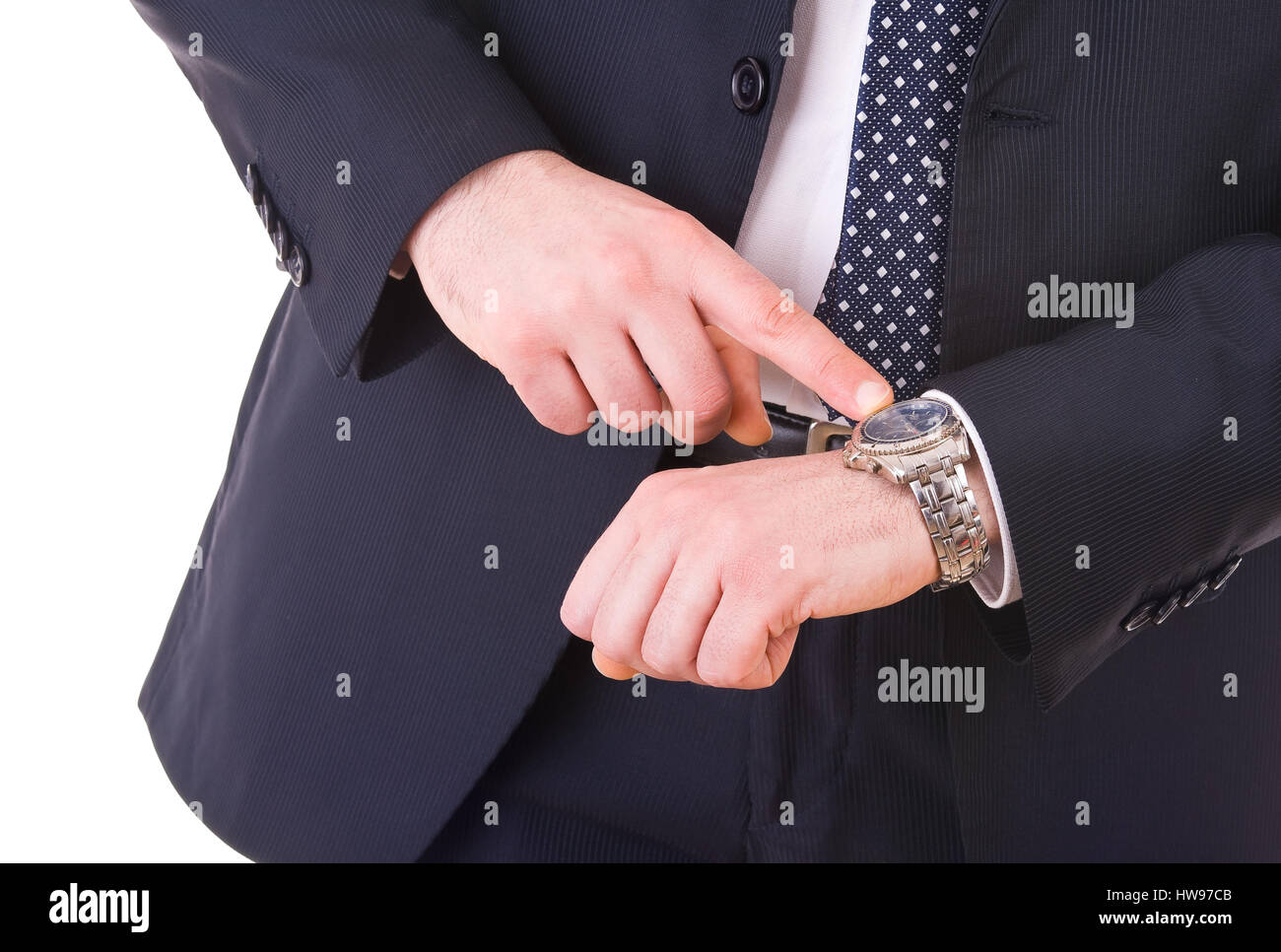 Businessman pointing at his wristwatch Stock Photo - Alamy
