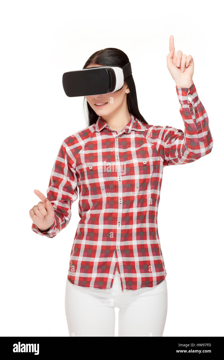 Girl in headset of VR gesturing and pointing by fingers Stock Photo - Alamy