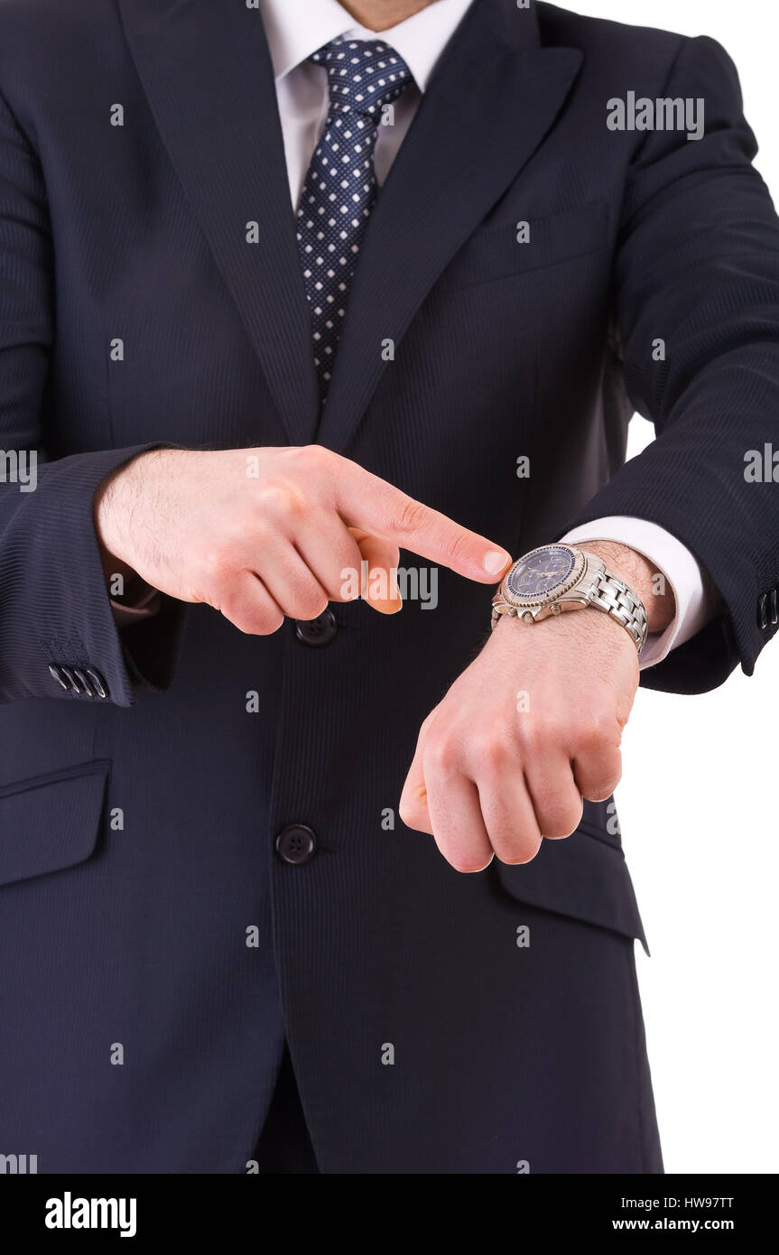 Businessman pointing at his wristwatch Stock Photo - Alamy
