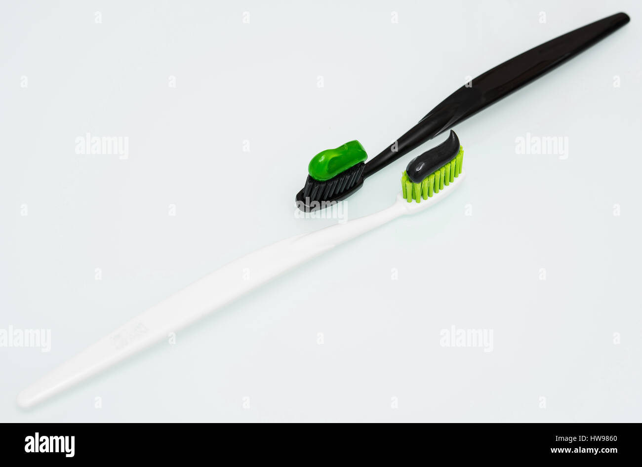 black and white toothbrush on a white table Stock Photo - Alamy