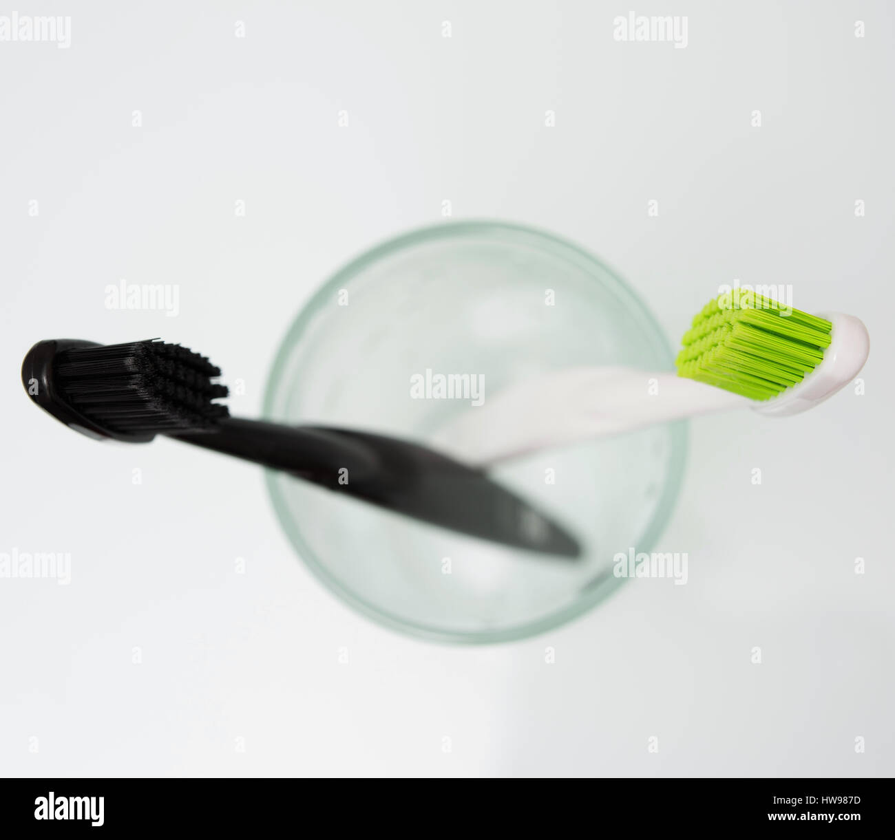two toothbrushes in a glass beaker Stock Photo - Alamy two toothbrushes in a glass beaker Stock Photo - Alamy