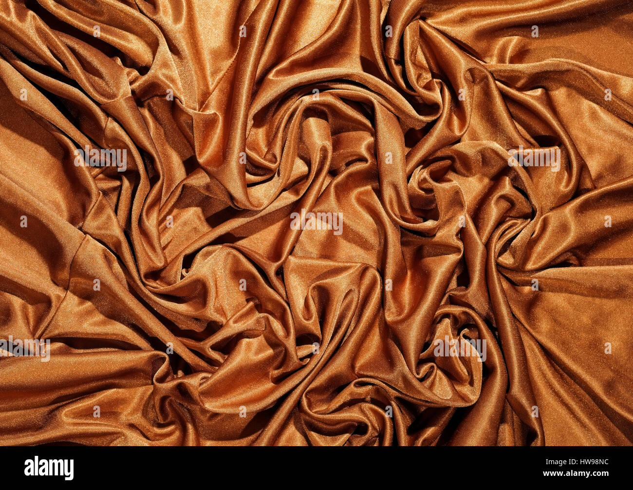 Cloth background in golden color Stock Photo - Alamy