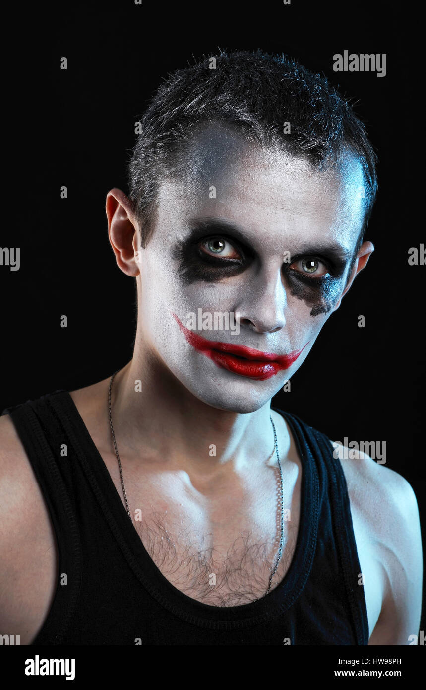 Spooky man on black background Stock Photo - Alamy