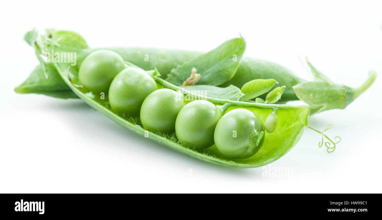 Open pea pod on a white background Stock Photo - Alamy