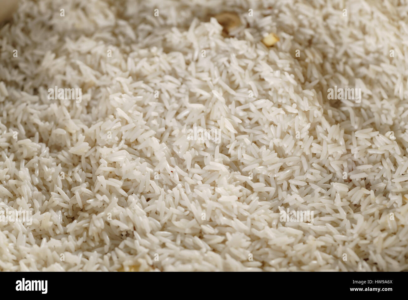 pilaf covered by rice preparing Stock Photo - Alamy