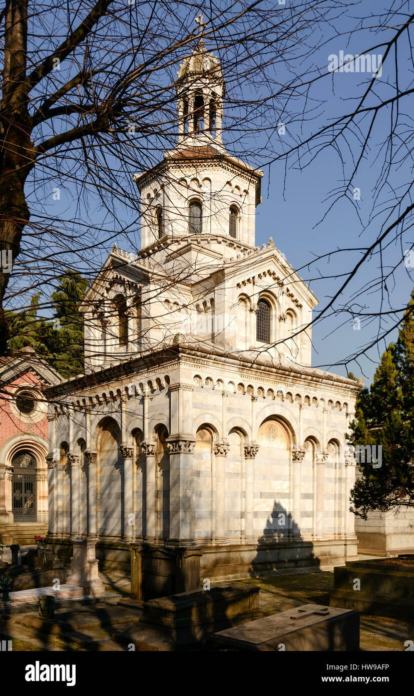 view of big mausoleum among trees at large monumental Cemetery in town ...