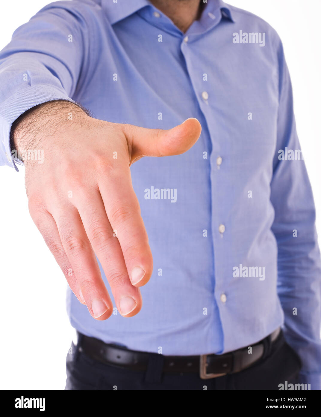 Young business man giving hand Stock Photo - Alamy