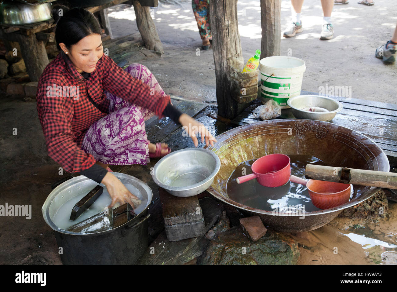 Woman Washing up in Preah Dak Village after making Noodles, in Siem ...