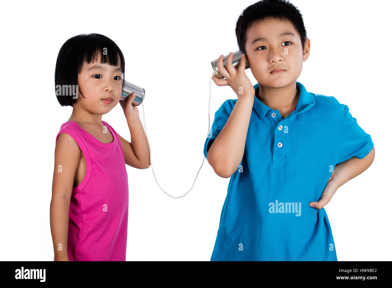 Asian Chinese Kid Playing with Tin Can Phone isolated on White ...