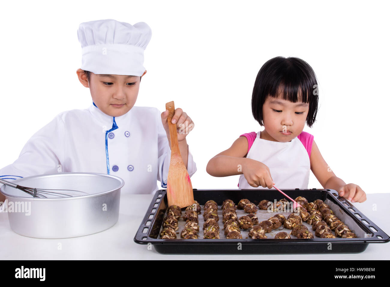Asian Chinese Kid Baking Cookies in isolated white background Stock ...