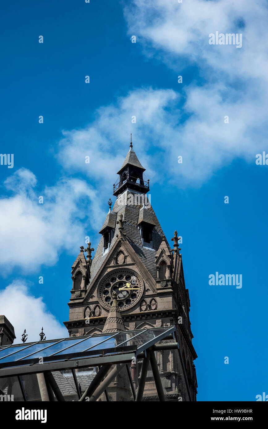 The town hall was opened in 1869. It is in Gothic Revival style and has ...