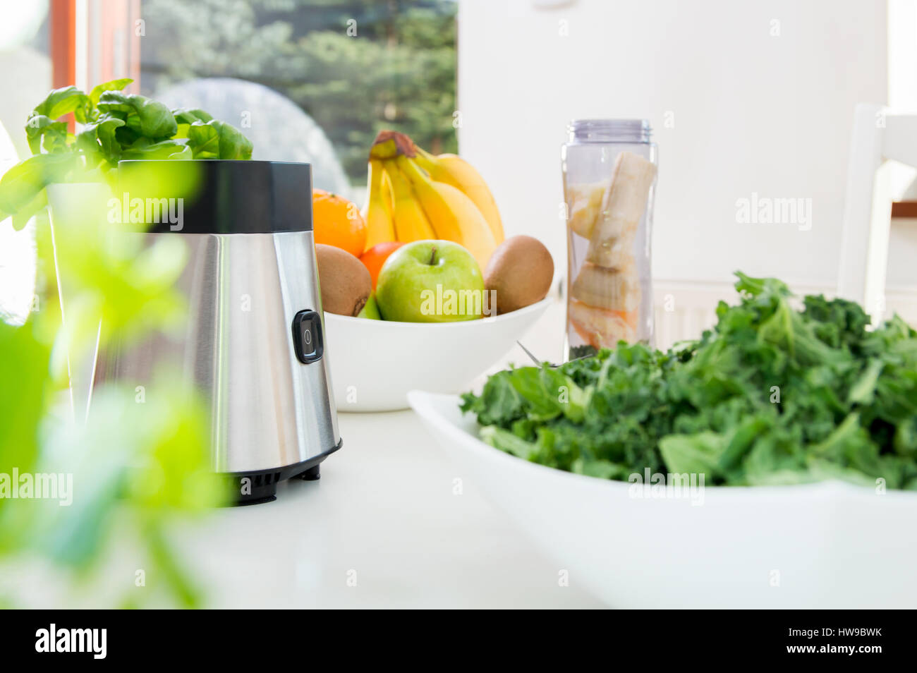 Device for making smoothie on the kitchen counter with fresh fruit ...