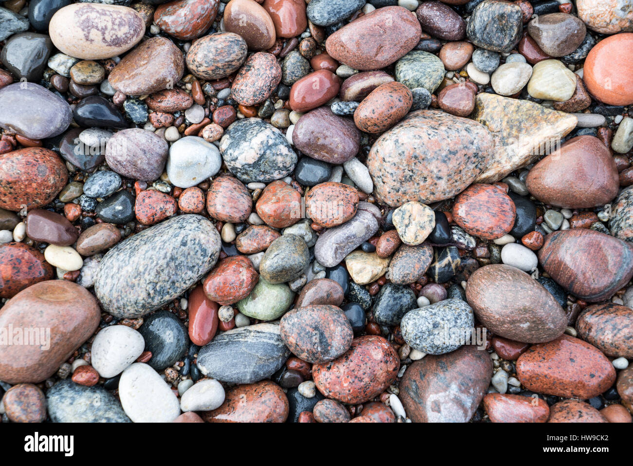 small pebble rock background texture at the beach Stock Photo - Alamy