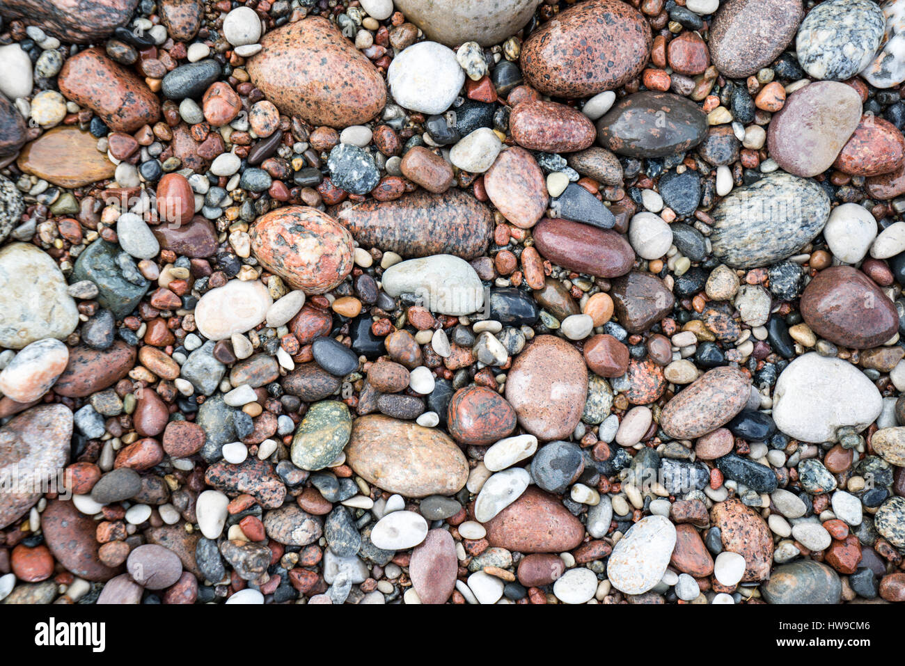 small pebble rock background texture at the beach Stock Photo - Alamy
