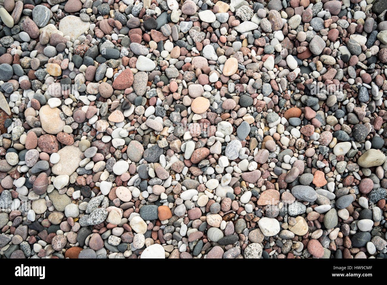 small pebble rock background texture at the beach Stock Photo - Alamy
