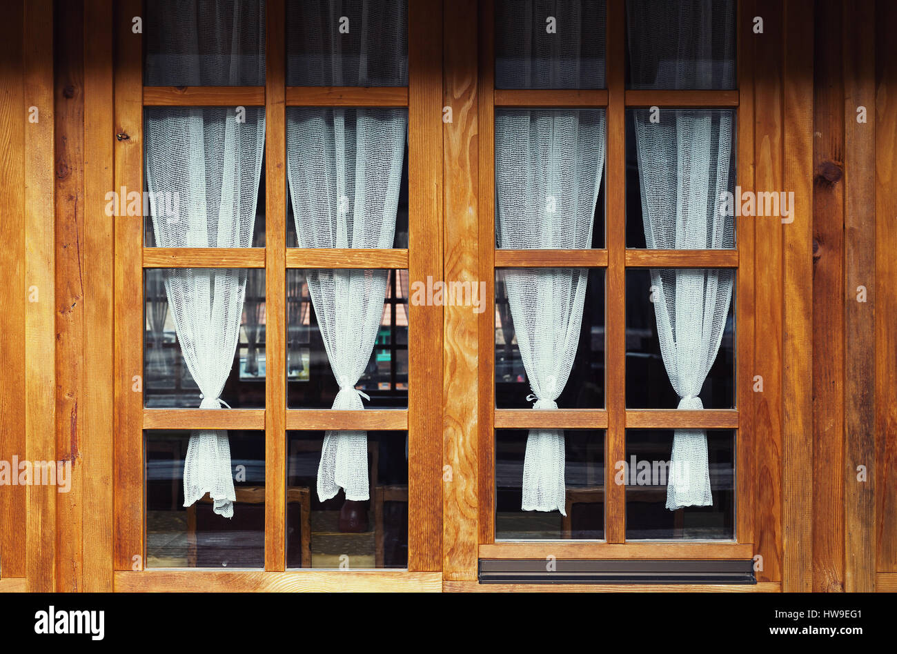 Wooden decorative windows with old fashioned white curtains Stock Photo ...