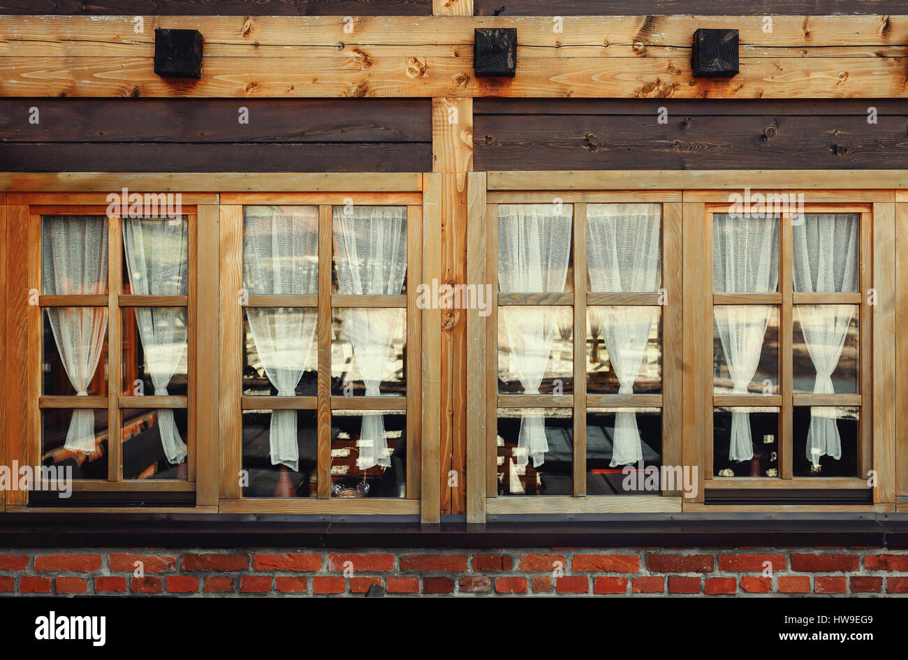 Wooden decorative windows with old fashioned white curtains Stock Photo ...