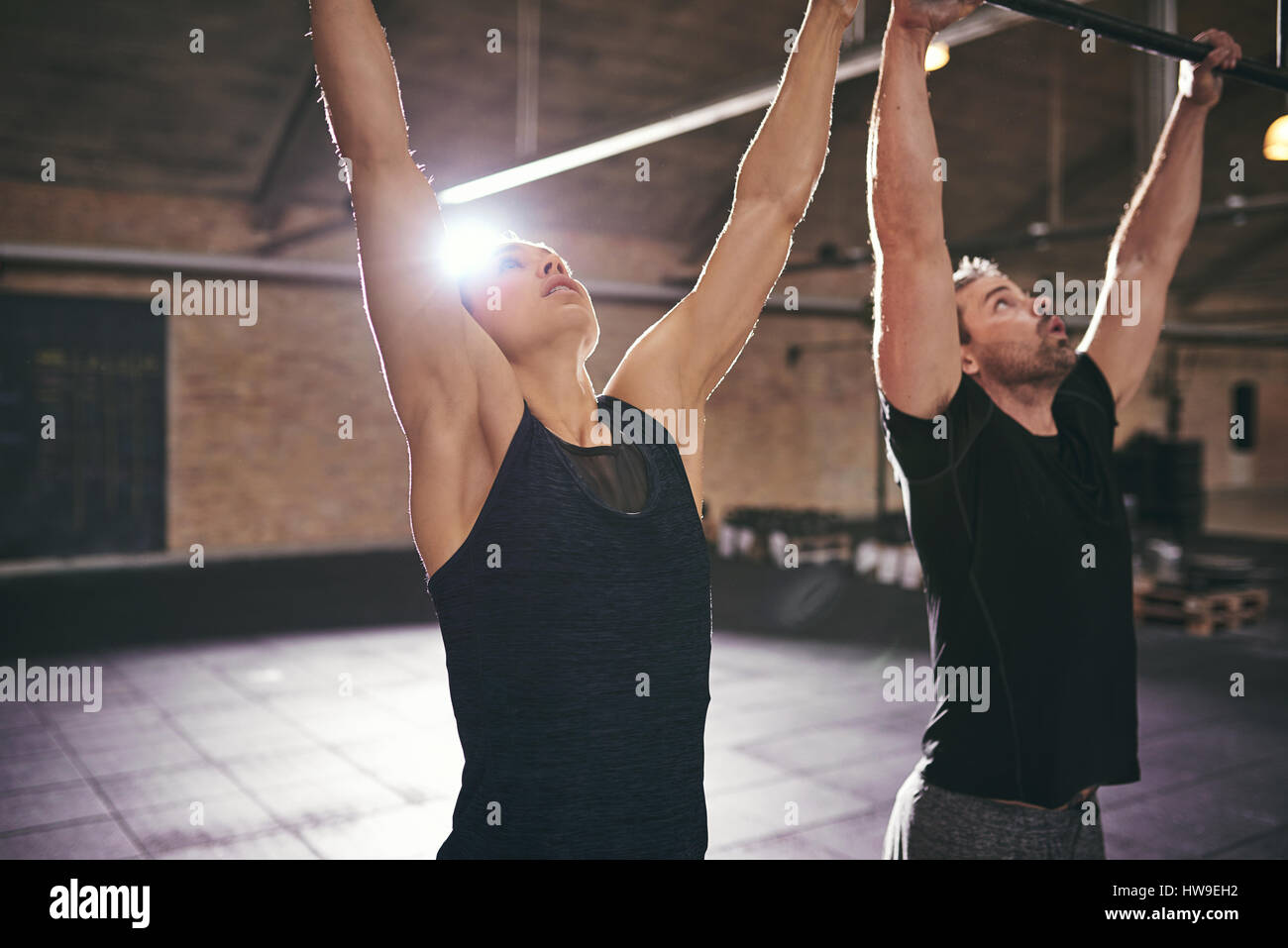 Woman doing pull ups hi-res stock photography and images - Alamy