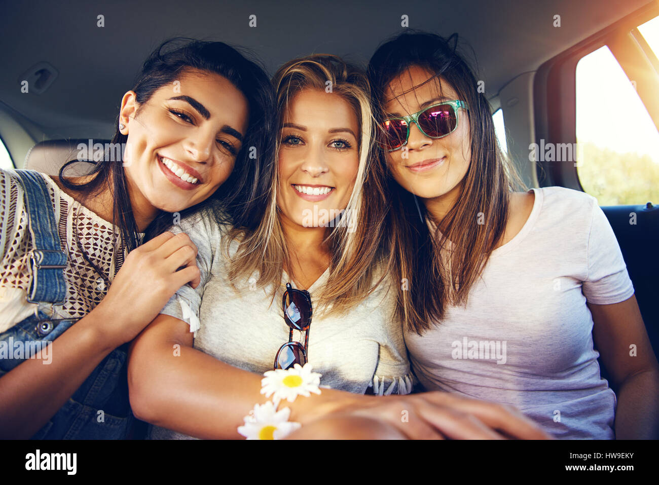Three teenagers girls posing hi-res stock photography and images - Alamy