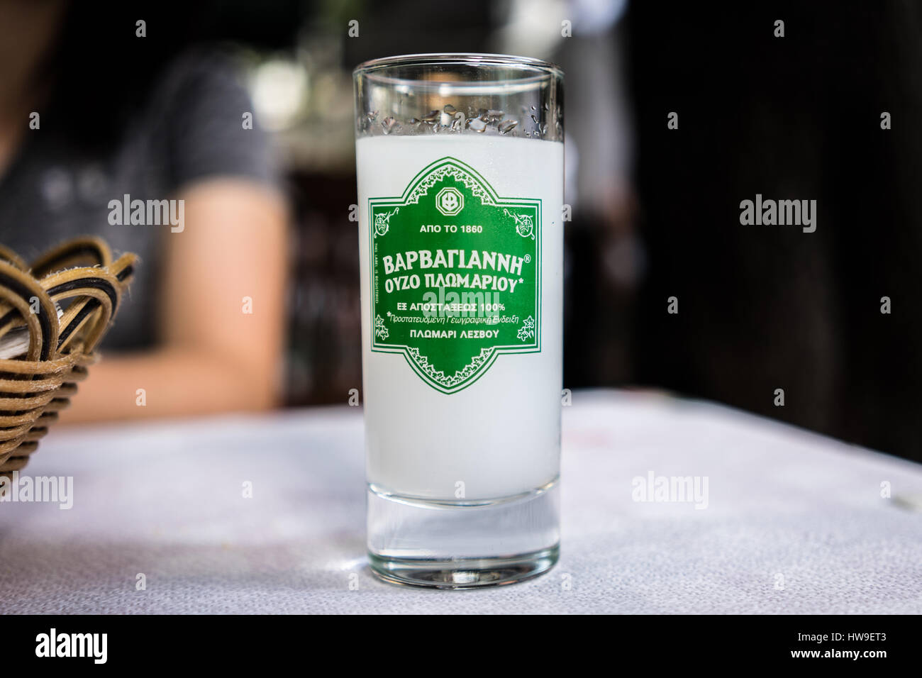 A shotglass of ouzo in Athens, Greece Stock Photo - Alamy