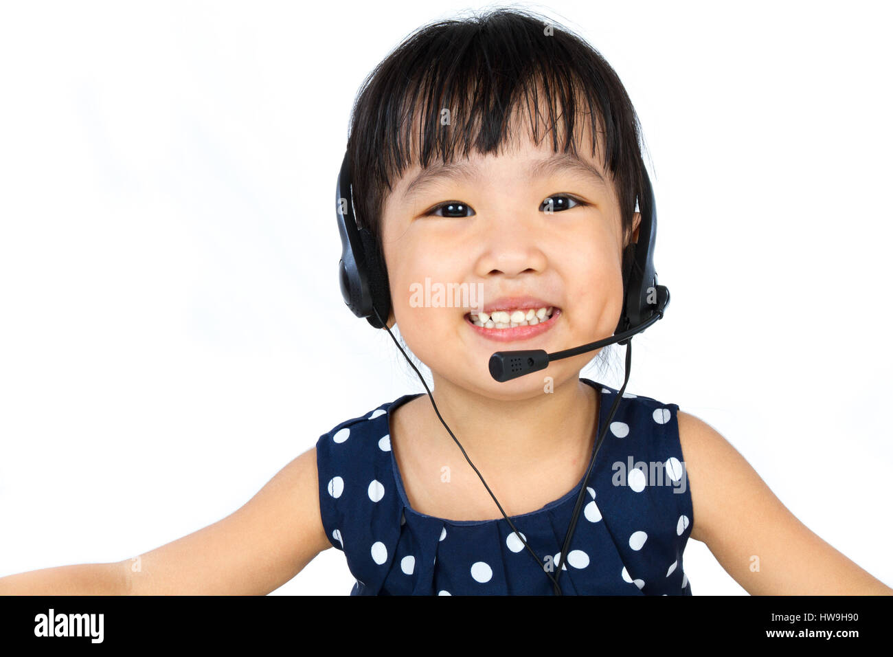 Asian Little Chinese Girl Wearing Headset isolated on White Background ...