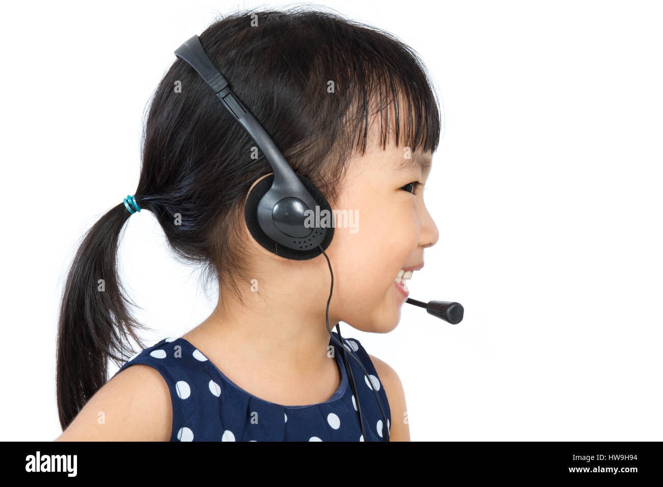 Asian Little Chinese Girl Wearing Headset isolated on White Background ...