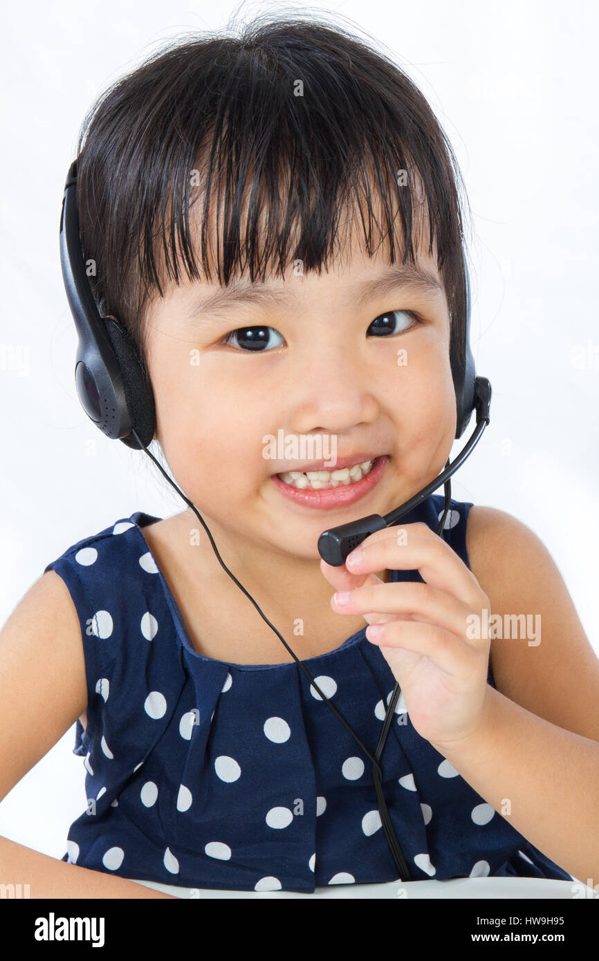 Asian Little Chinese Girl Wearing Headset isolated on White Background ...