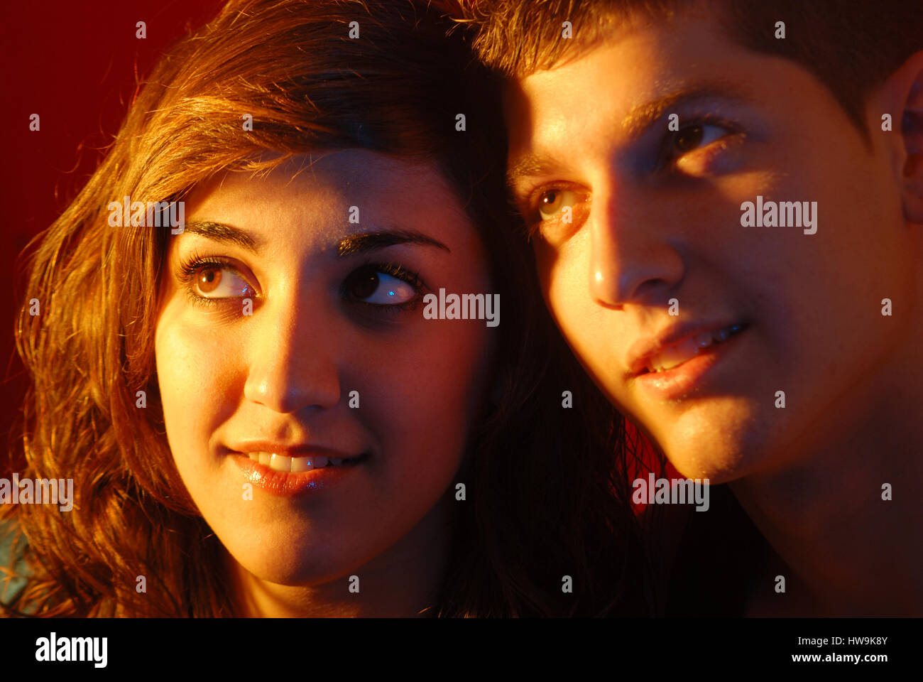 Young couple looking up. Close view Stock Photo - Alamy