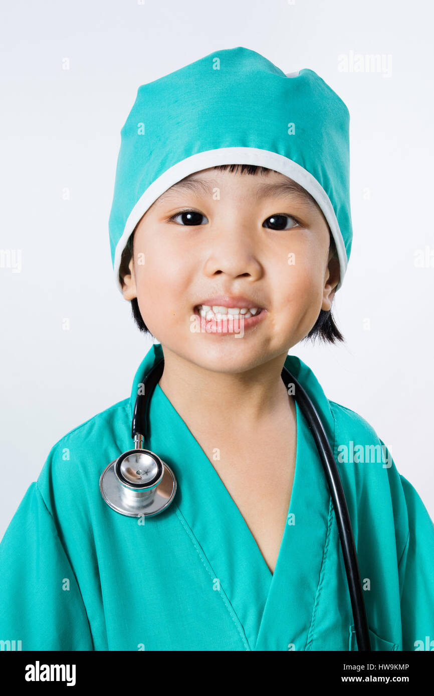 Asian Little Chinese Girl Playing a Doctor with Stethoscope in isolated ...