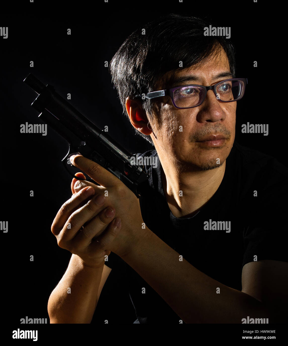 Chinese Man With A Gun High Resolution Stock Photography and Images - Alamy