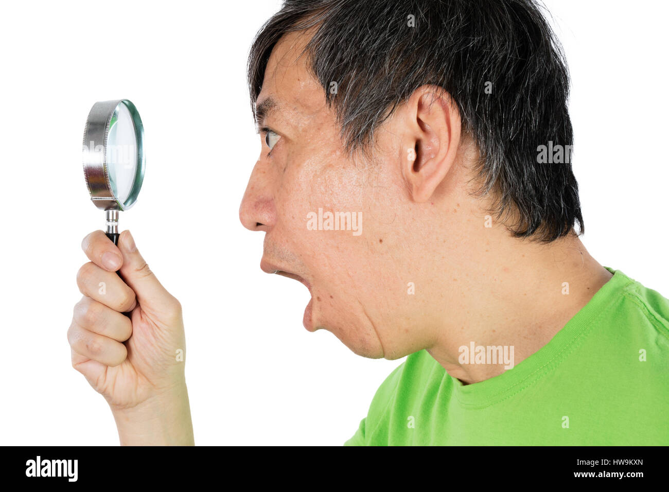 Asian Chinese Man Looking through a Magnifying Glass in isolated White ...