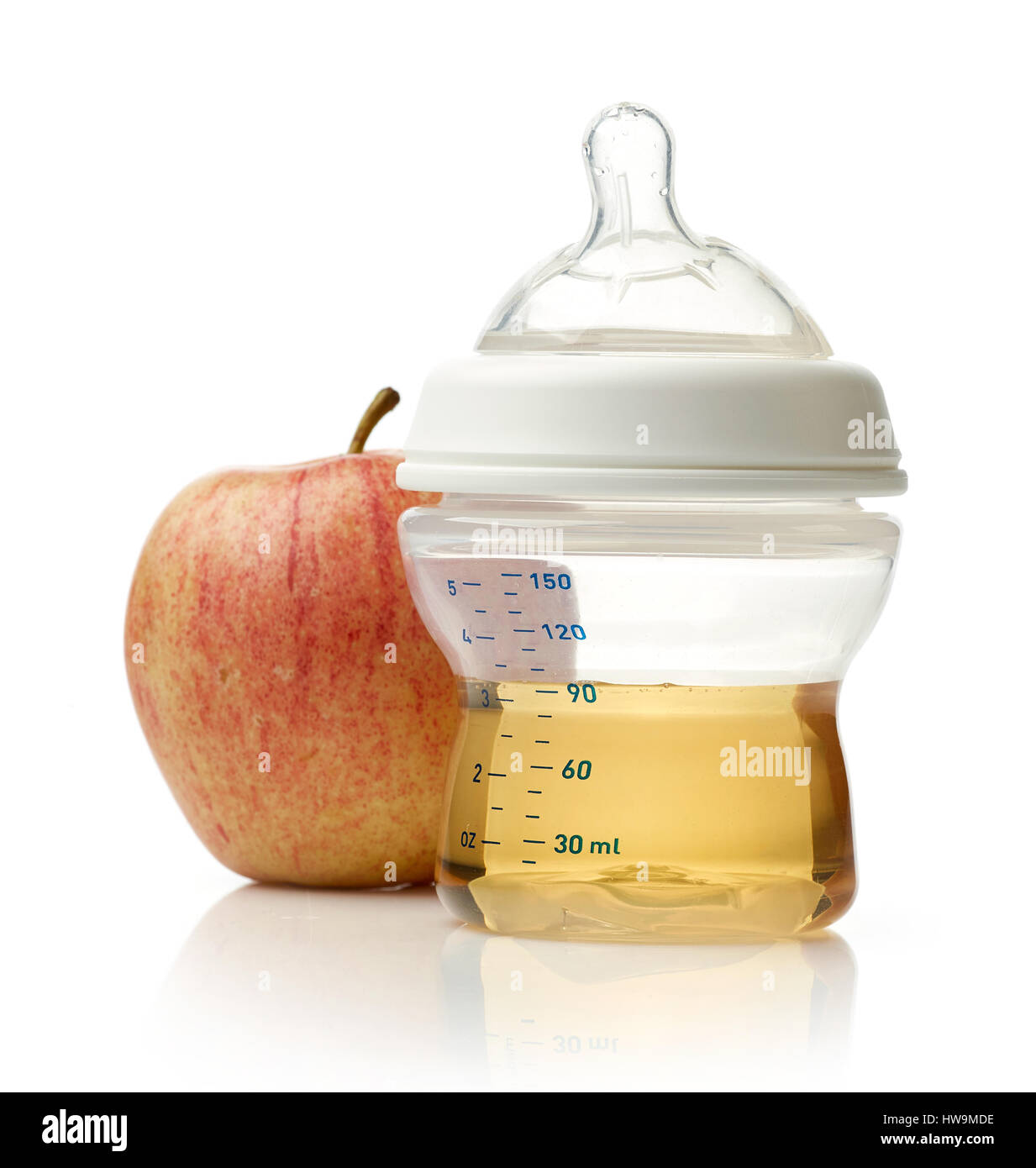 Apple juice in baby bottle isolated on white background Stock Photo - Alamy