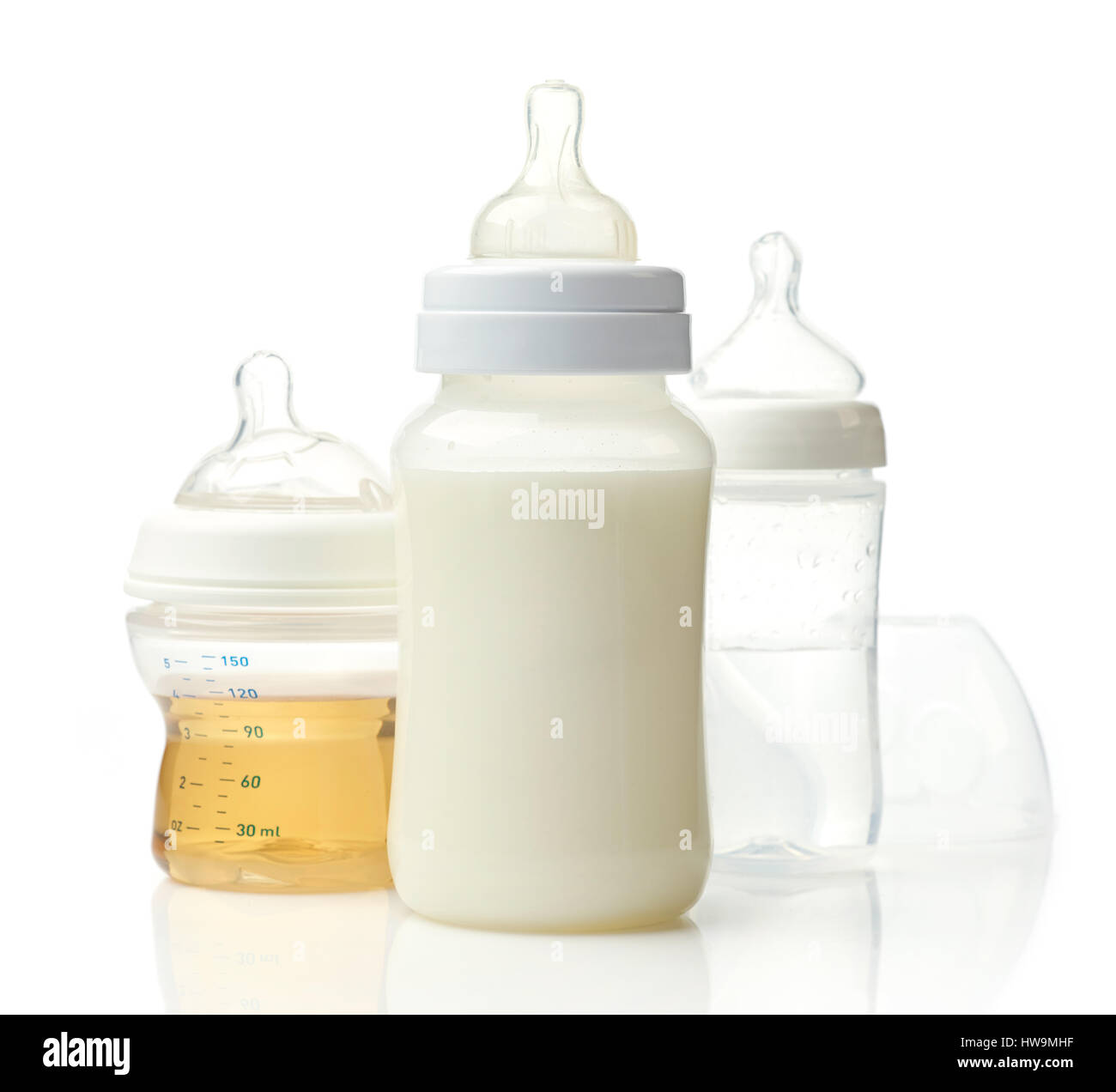 various baby bottles isolated on white background Stock Photo - Alamy