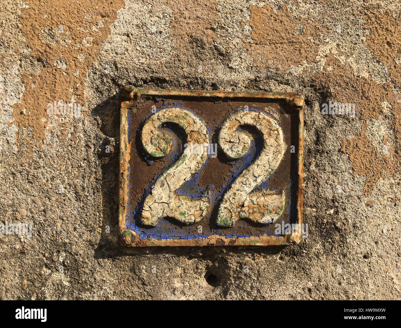 Vintage grunge square metal rusty plate of number of street address ...