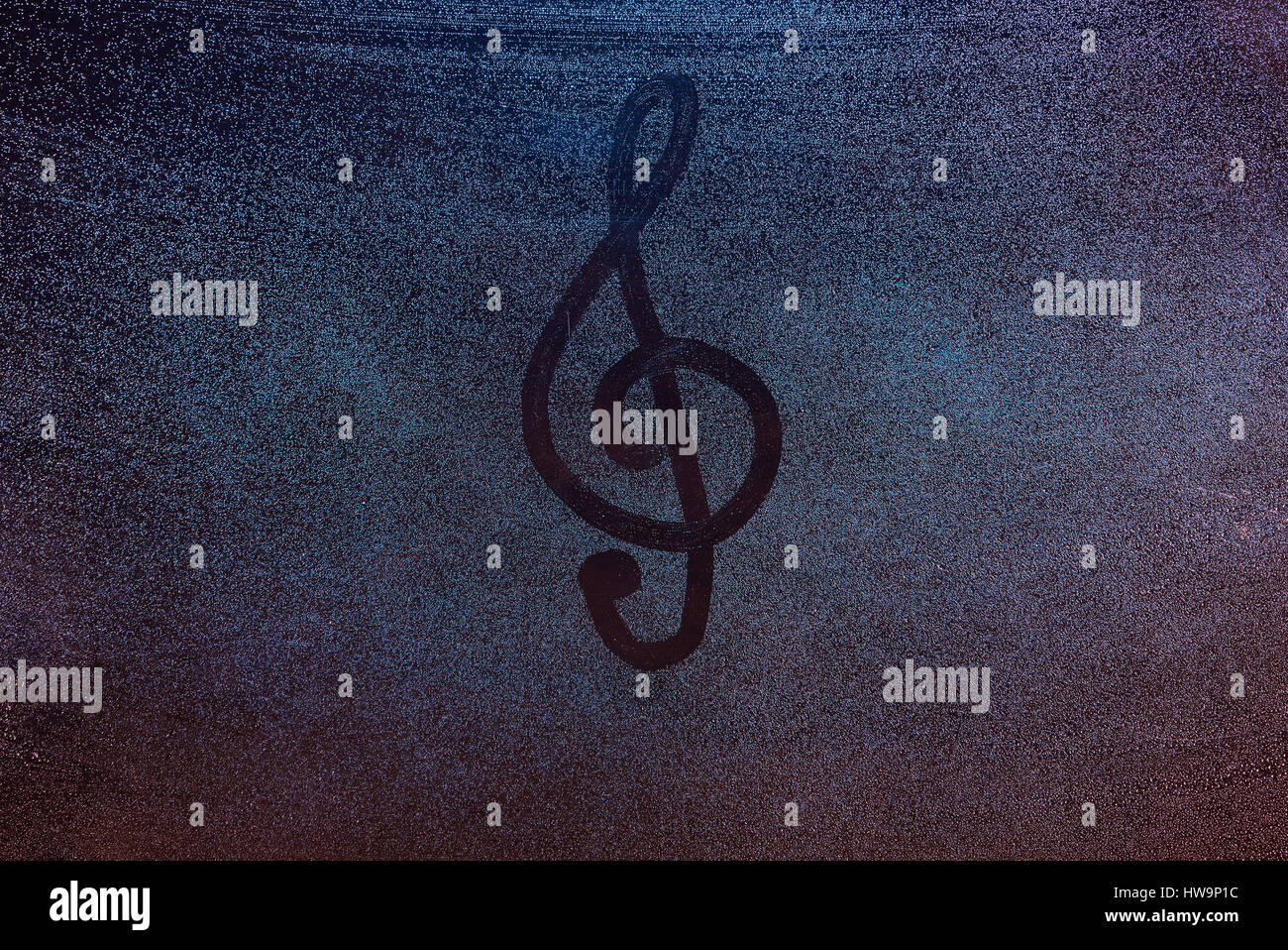 Music key symbol draw on foggy window. Musician key on frozen wet ...
