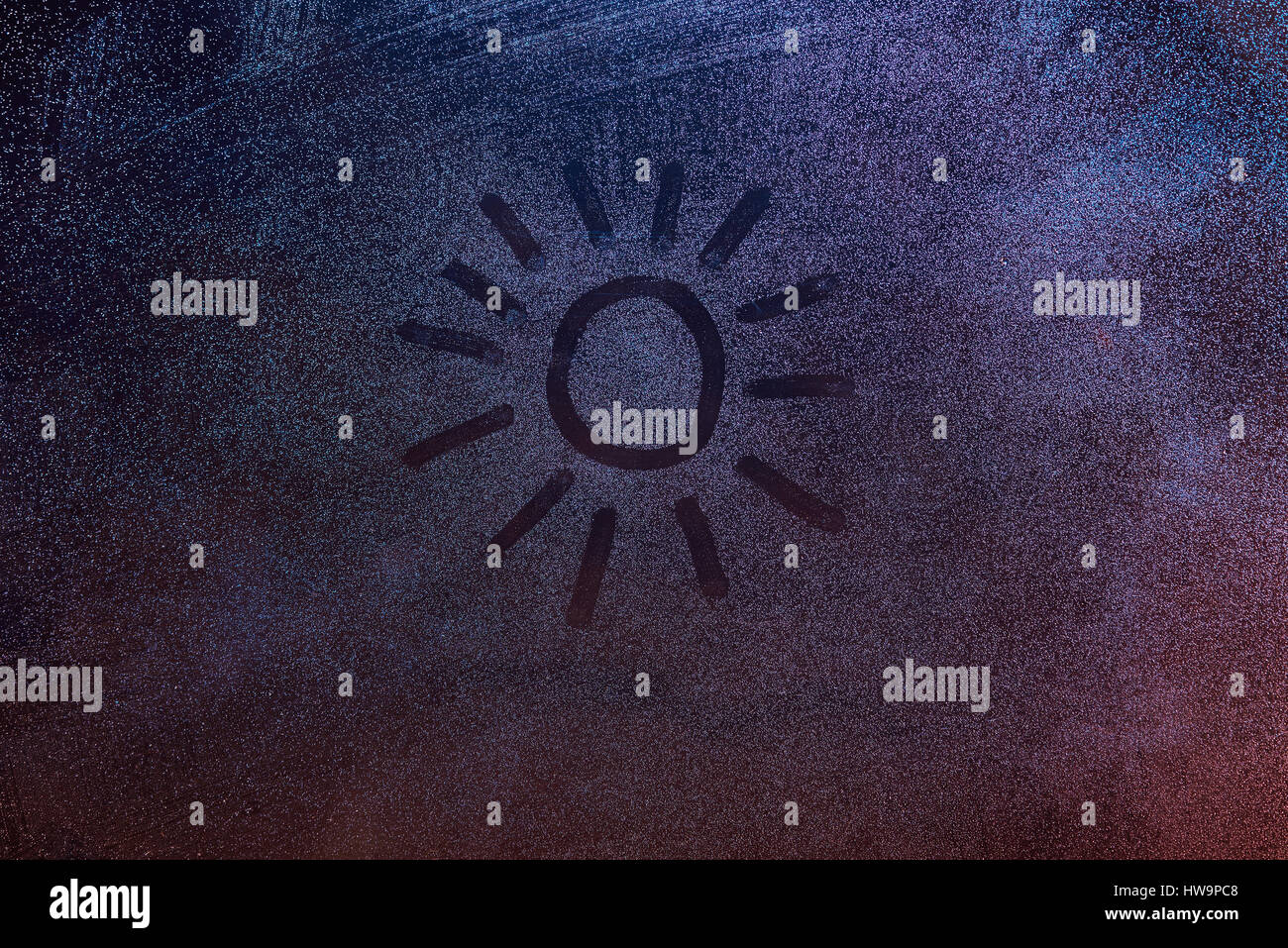 Sun draw on window with dew. Drawing on frozen window Stock Photo - Alamy