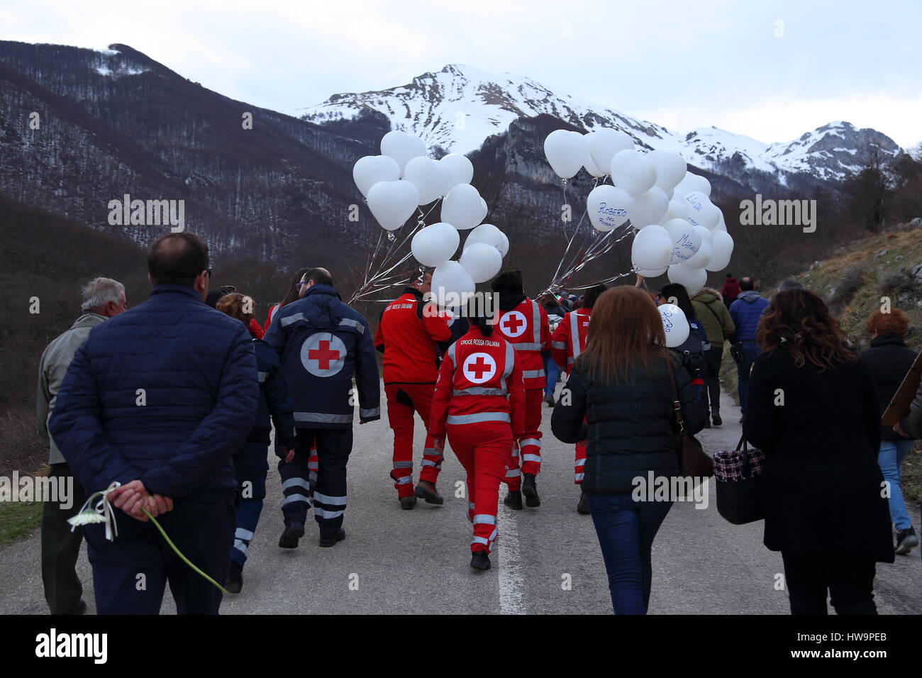 White balloons with the names of the victims are brought to the hotel ...