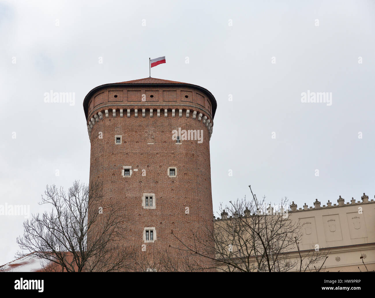 Wawel Royal castle Senator tower with Polish flag in Krakow, Poland ...