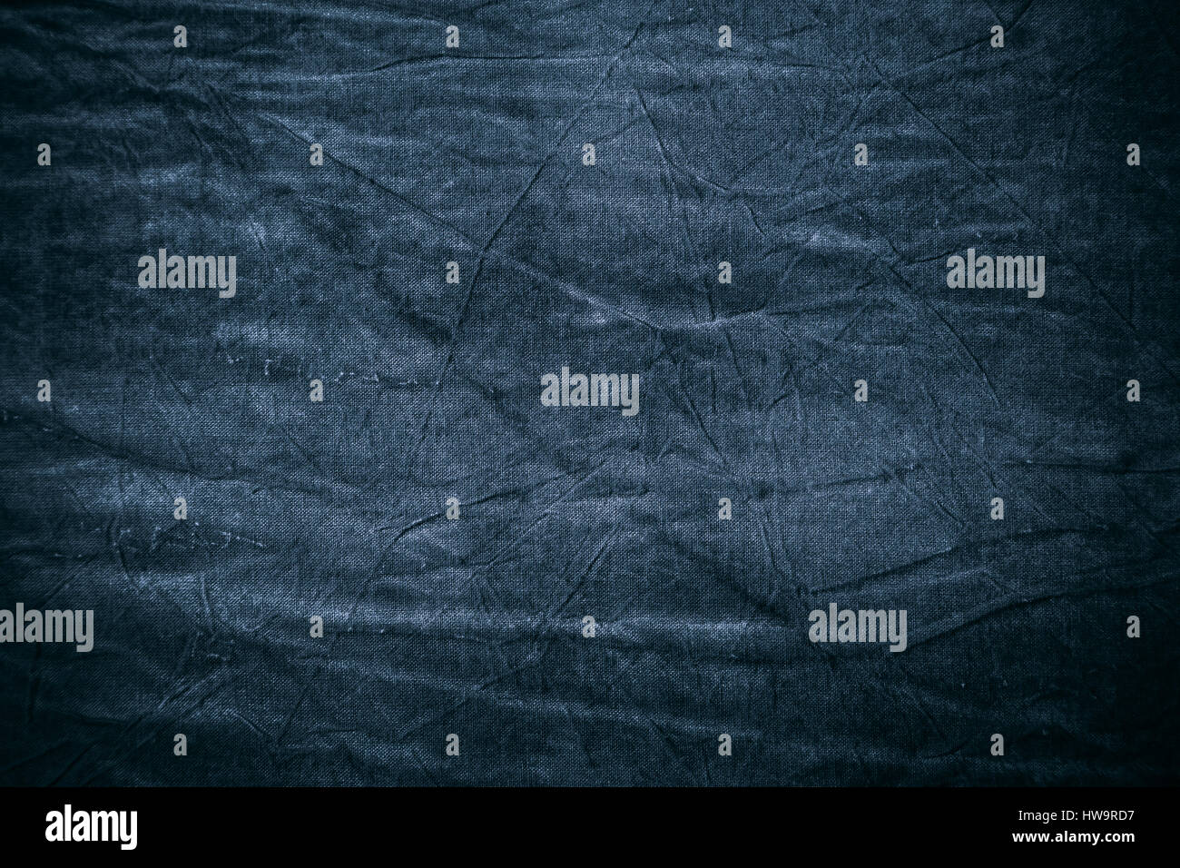 Texture of dark blue crumpled fabric Stock Photo - Alamy