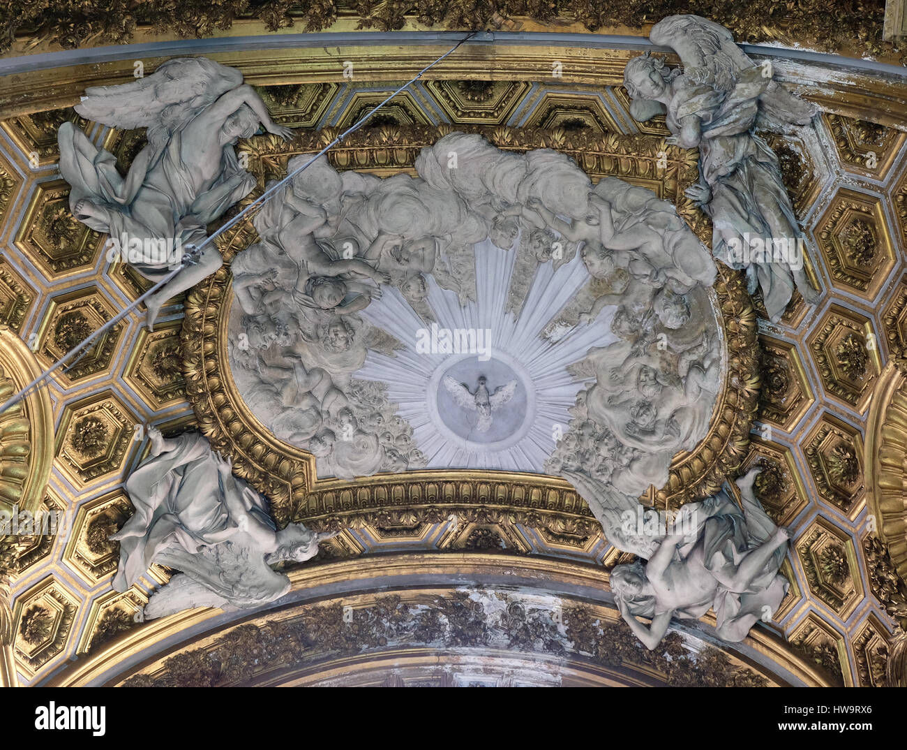Holy spirit and angels, stucco decoration on the ceiling of chapel of ...