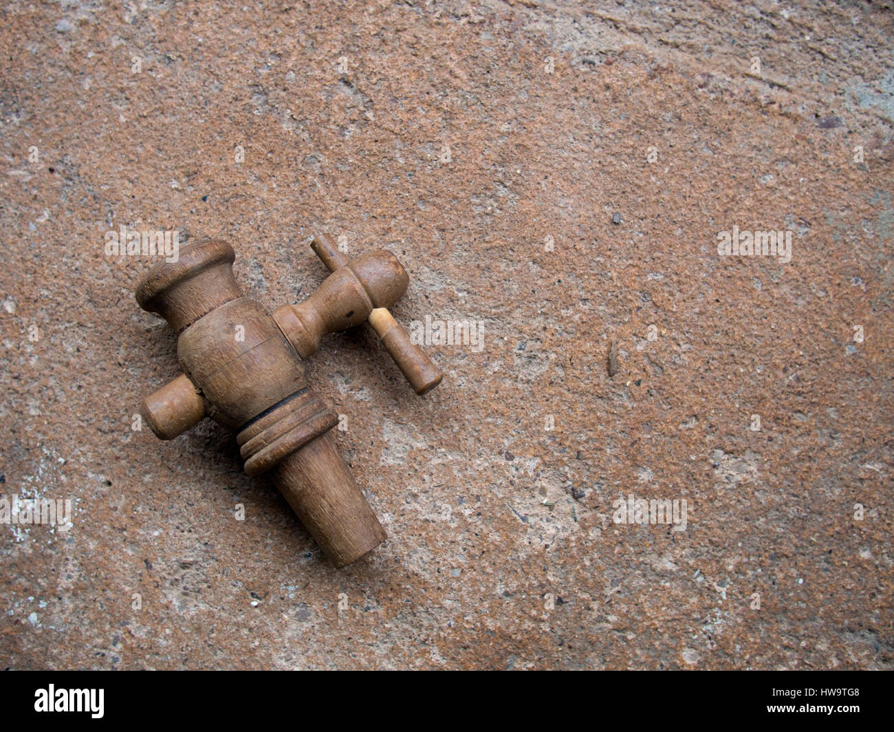 Old wooden tap for barrel. From cider making Stock Photo - Alamy