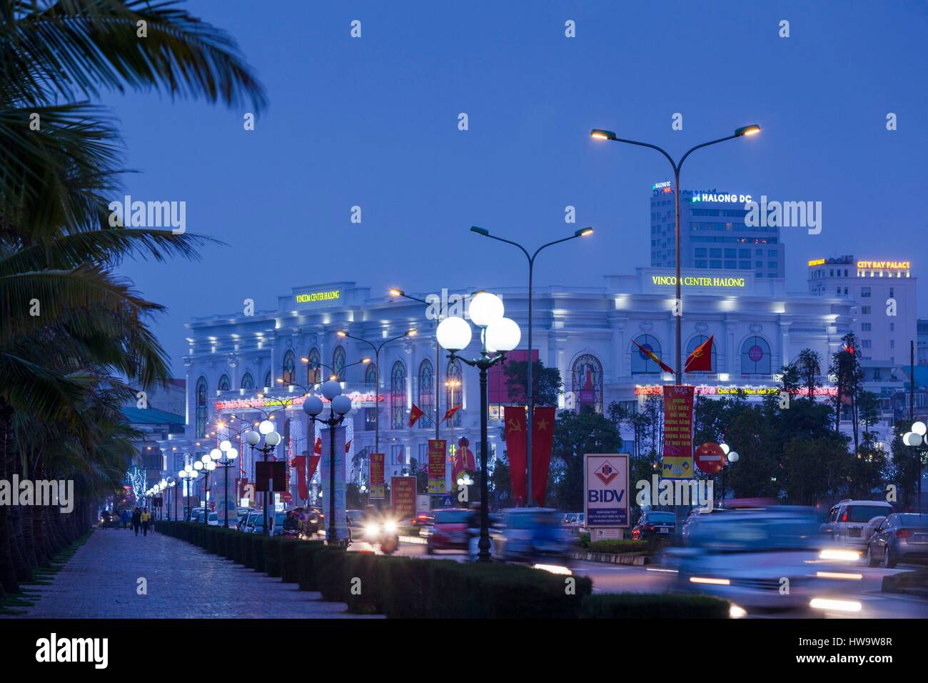 Vietnam, Halong City, Halong Bay waterfront promenade, dusk Stock Photo ...