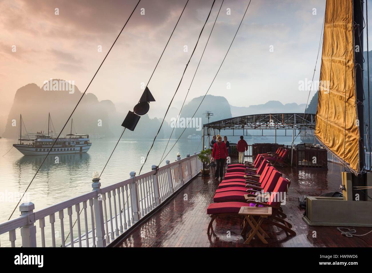 Vietnam, Halong Bay, tourist boat, deck view, dawn Stock Photo - Alamy
